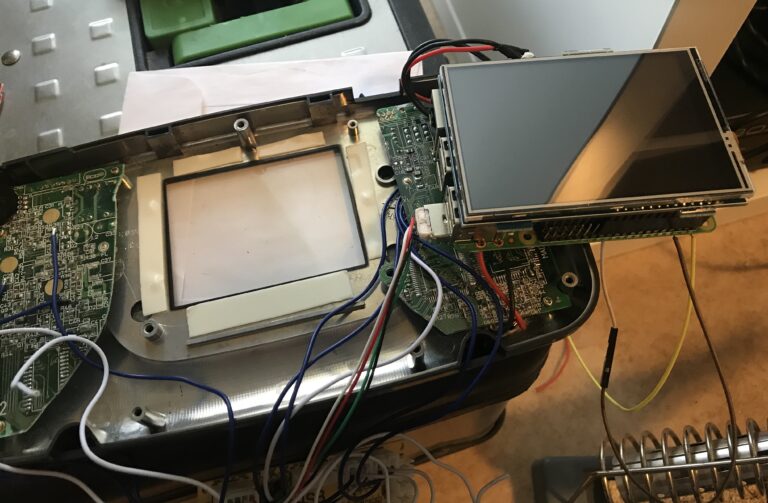 Game Gear with a dark screen: capacitor change - Dreamcast.nu